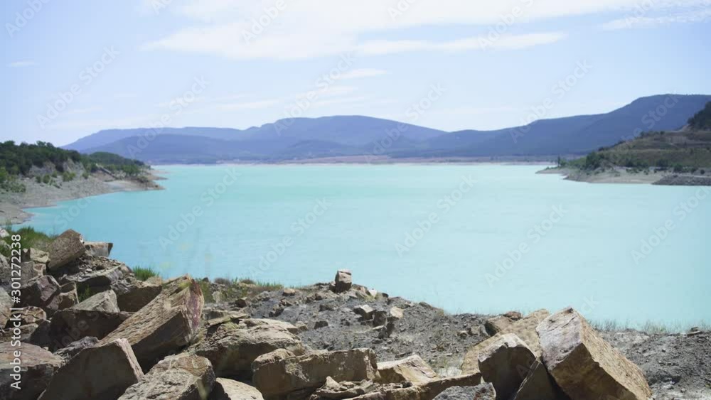 Beautiful blue turquoise Lake Yesa with water reflections near spanish ...
