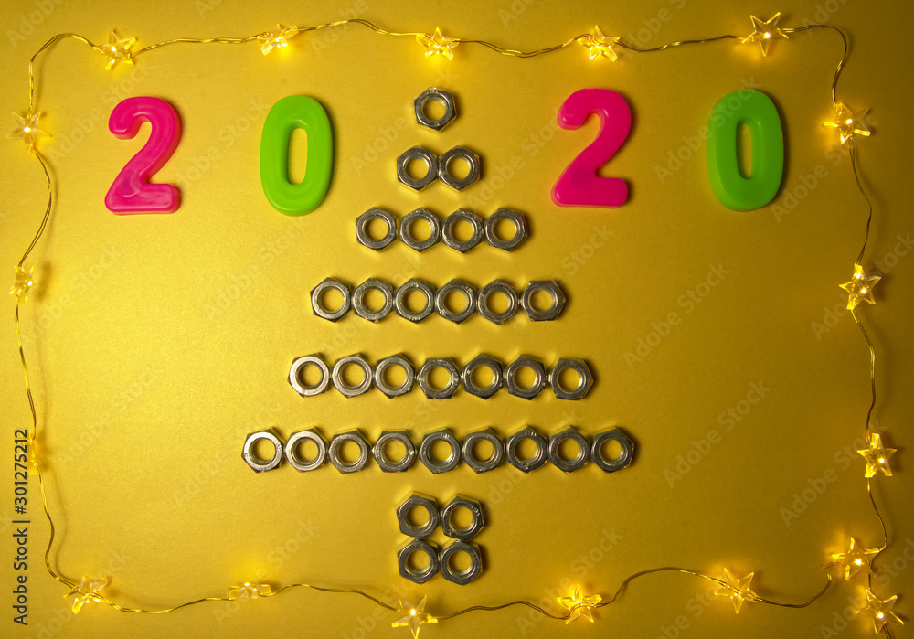 Happy New Year. 2020 Text from multi-colored plastic numbers on a ...
