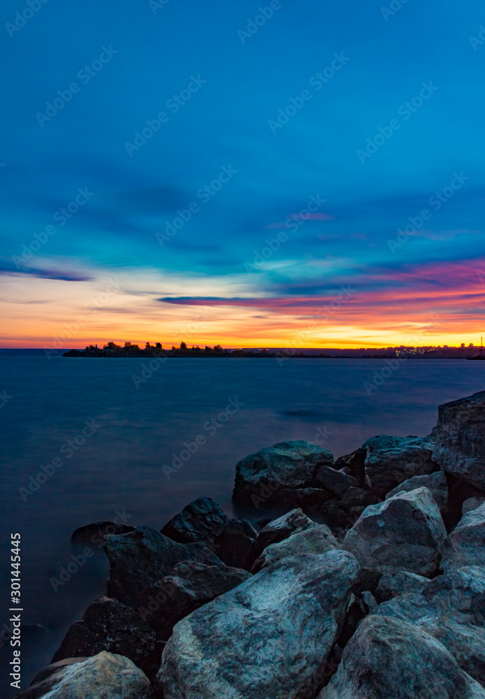 Sunset boulders beach landscape. Rocky boulders beach sunset view ...