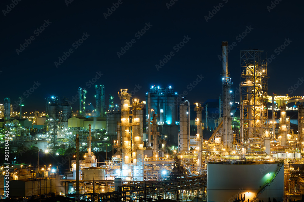 Oil and Gas refinery industry plant with glitter lighting, Factory at ...