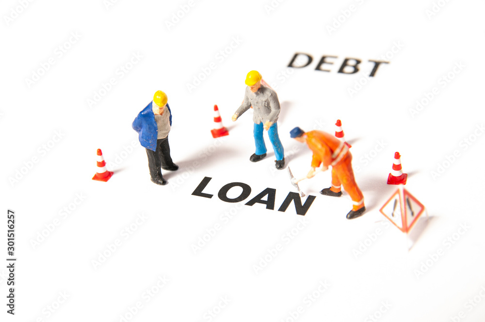 Miniature figurine work with loan letter digging word for money loan ...