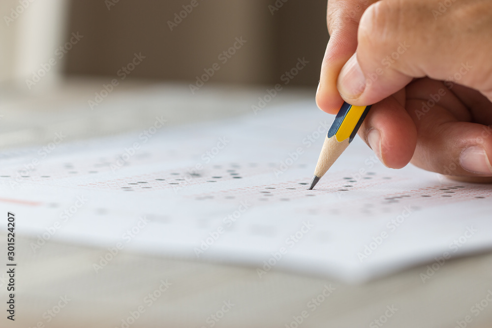 Education test exam concept, high school / university student holding ...