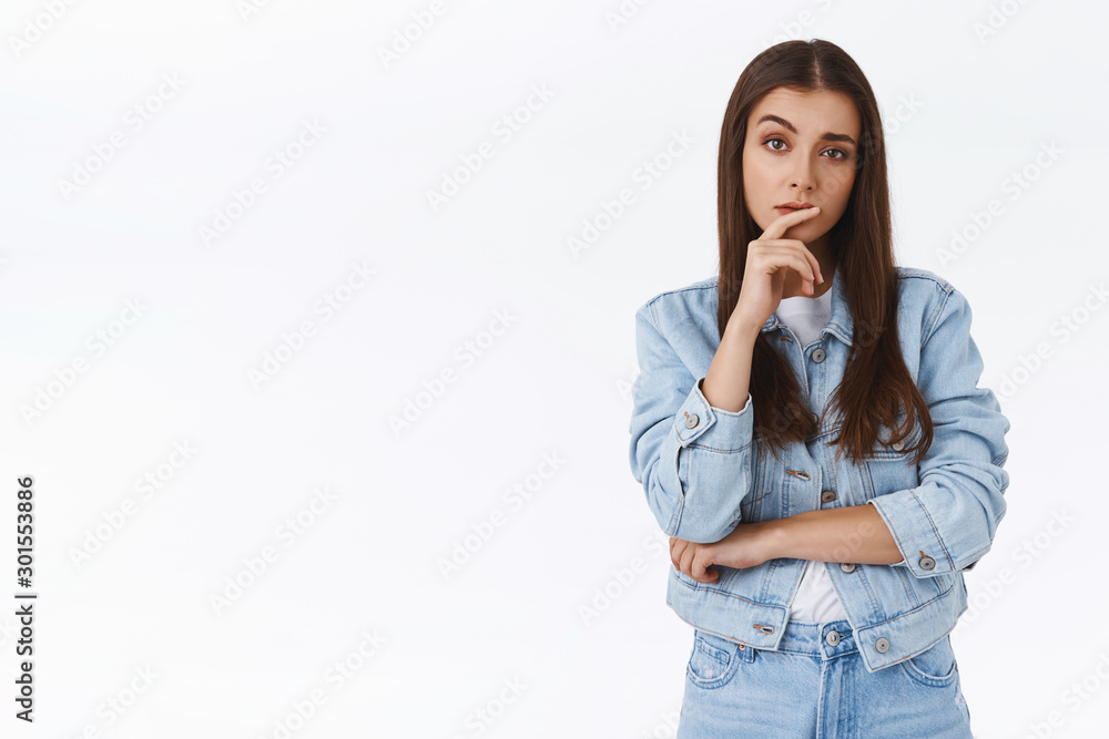 Skeptical, suspicious serious-looking thoughtful caucasian girl in ...