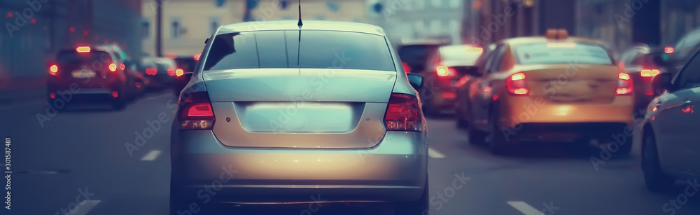 view of car in traffic jam / rear view of the landscape from window in ...