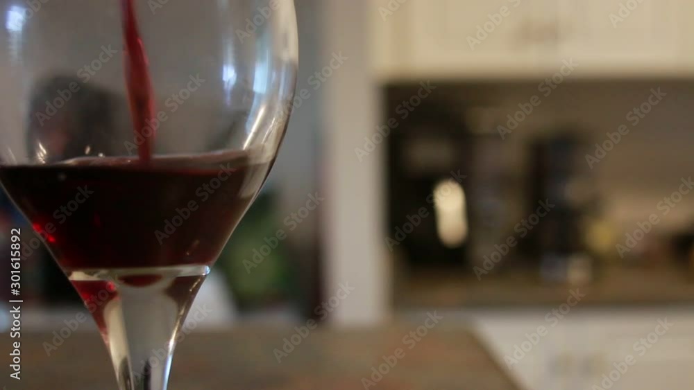 Low angle close up perspective of crystal clear wine glass with ...