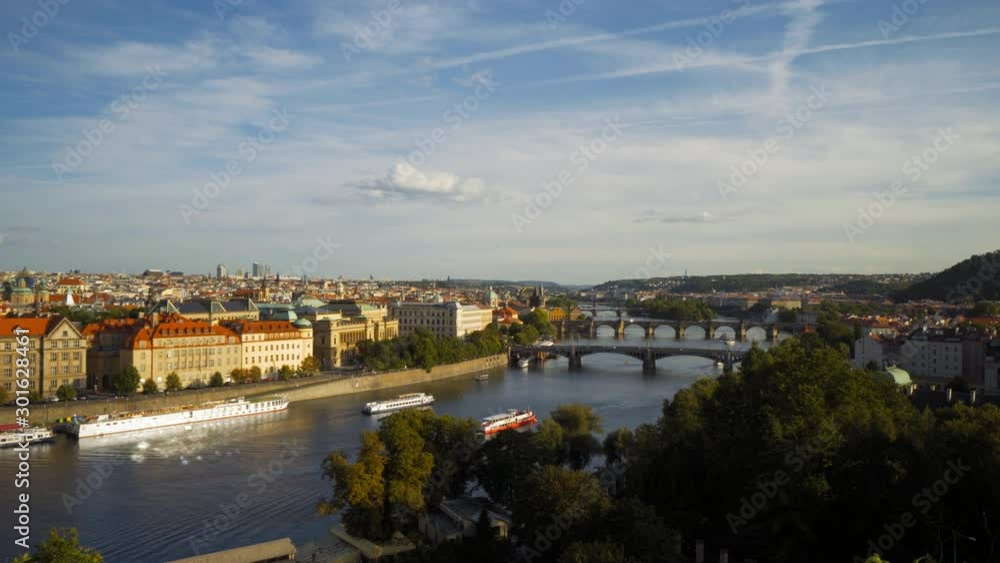 Prague bridges and famous Charles bridge across Vltava river with ships ...
