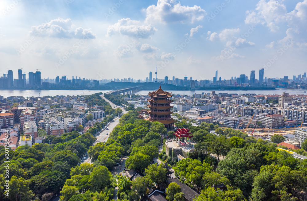 The yellow crane tower , located on snake hill in Wuhan, is one of the ...
