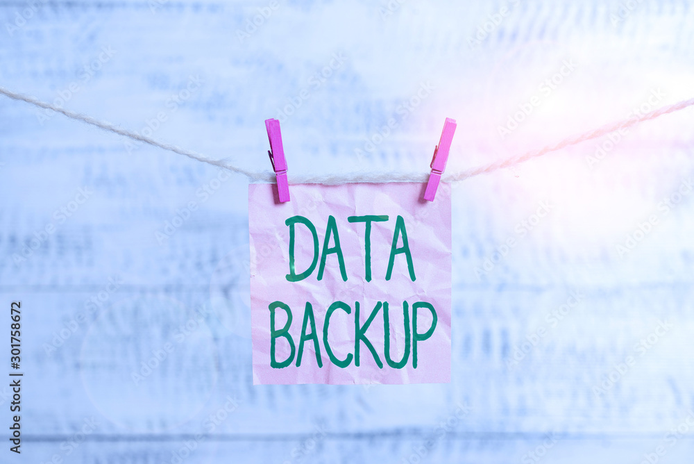 Conceptual hand writing showing Data Backup. Concept meaning copy of important data that is ...