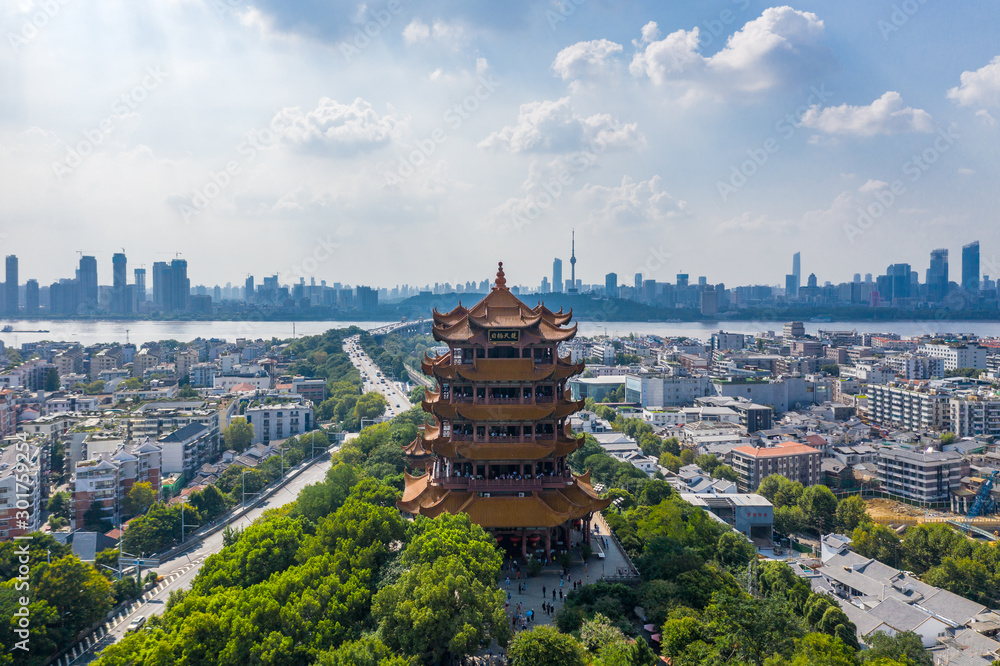 The yellow crane tower , located on snake hill in Wuhan, is one of the ...