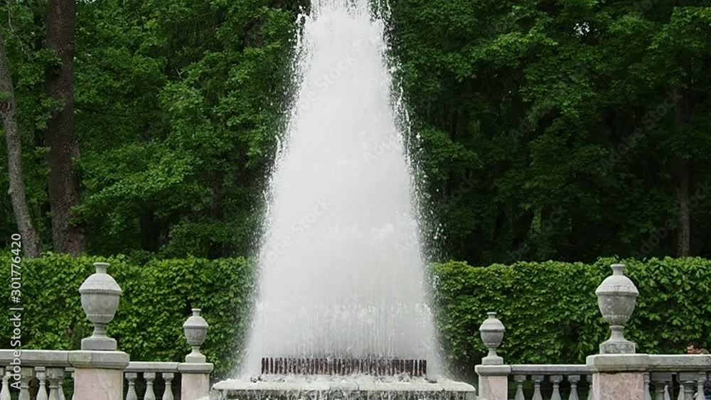 Beautiful garden with fountains on the geen background. Backdrop for ...