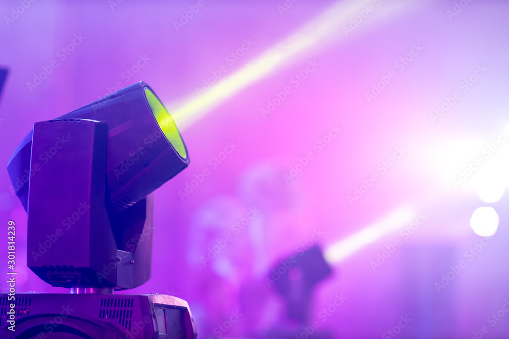 Scenic spot lights with bright beams in smoke, stage illumination ...