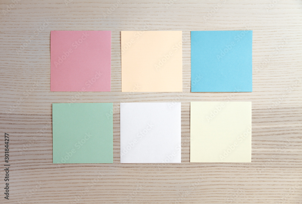 blank empty pastel colors sticky notes on clean wood background, from ...