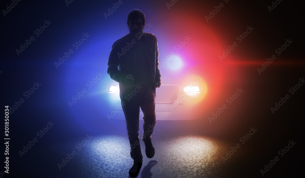 Silhouette of man running away from police car at night. Stock Photo ...