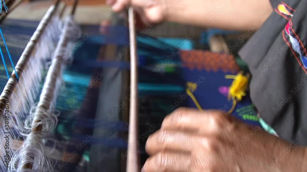 Traditional Sasak woman weaving Tenun Songket. Making Tenun Songket of ...