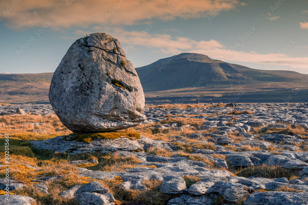 The striking erratic boulders resting on the pavements around ...