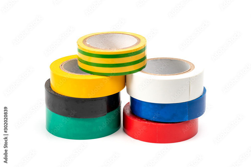 Rolls of insulation adhesive tape, multi colored ribbons on a white ...