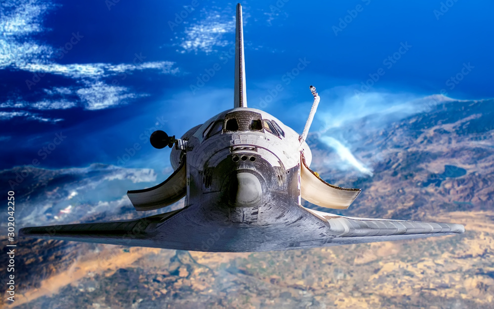 Space shuttle take off in the space from Earth. Stars and Planet on ...