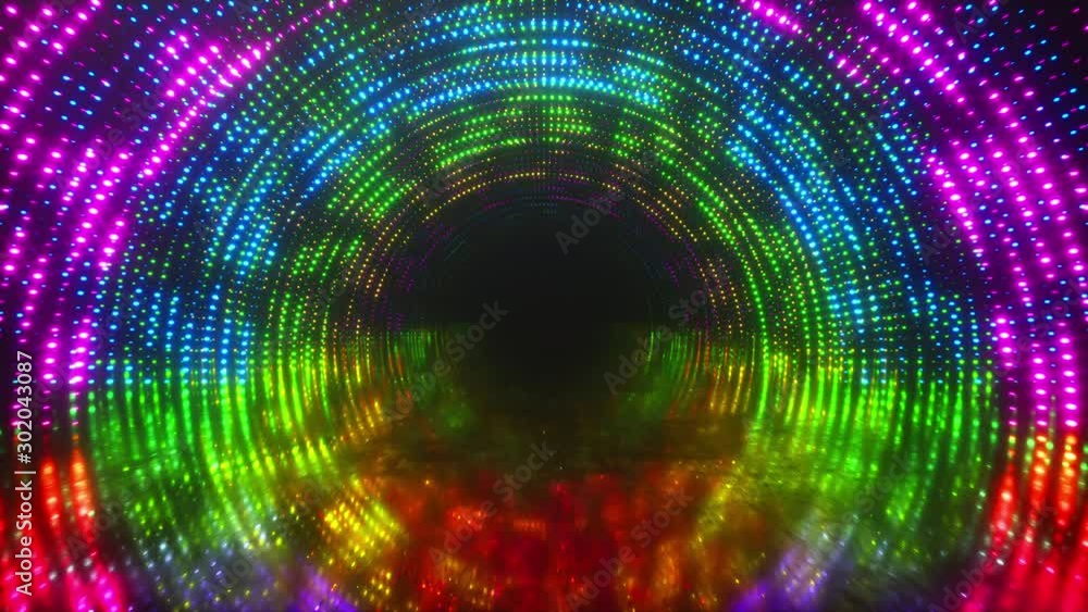 Bright light tunnel of luminous multi-colored dots and a reflective ...