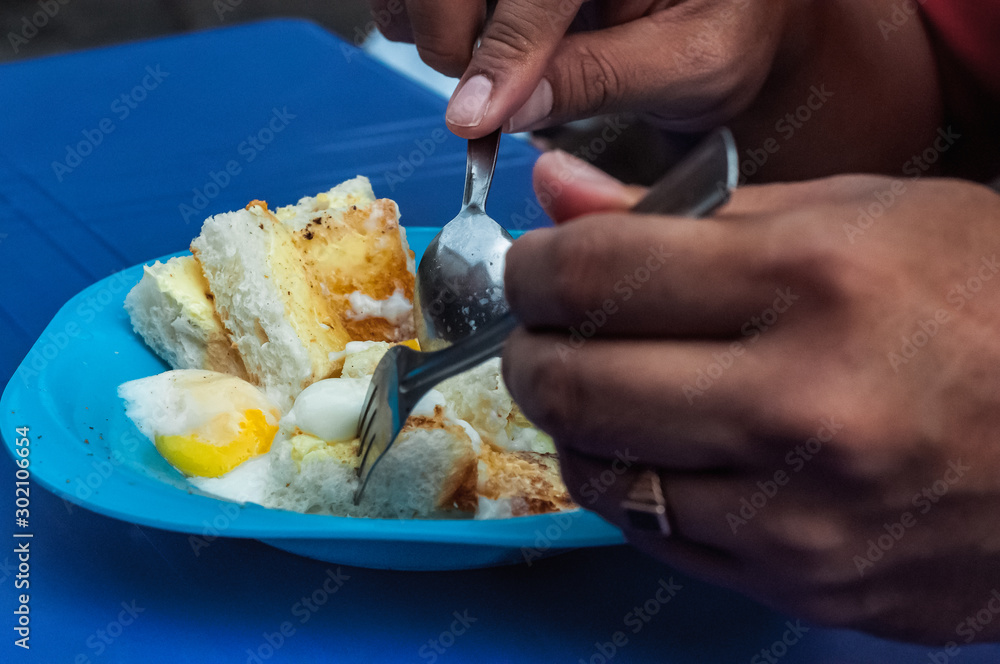 The Classic “roti Bakar Telur Goyang” Or Toast With A Half Boiled Egg