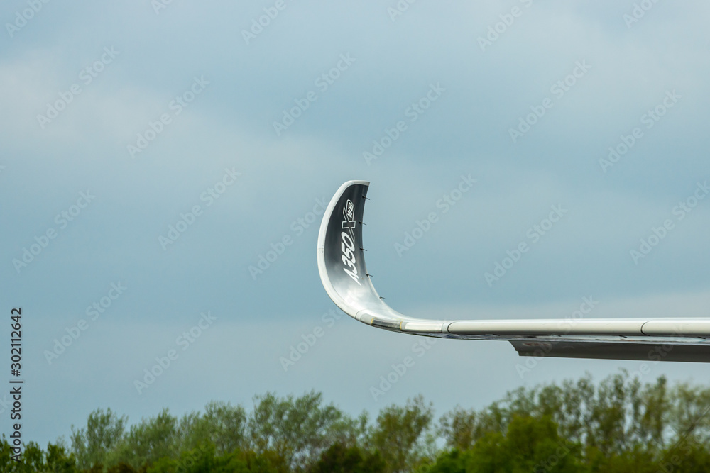 Fragment of wing (Wingtip device) of wide-body jet airliner Airbus A350 ...