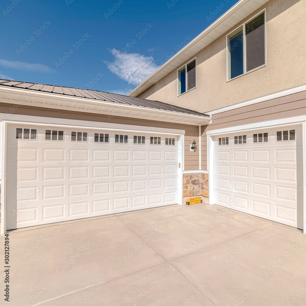 Square Drive way and garage of modern two storey home Stock Photo ...
