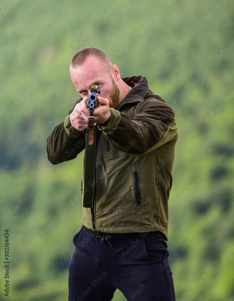 kill you. military style. male in camouflage. soldier in the field ...