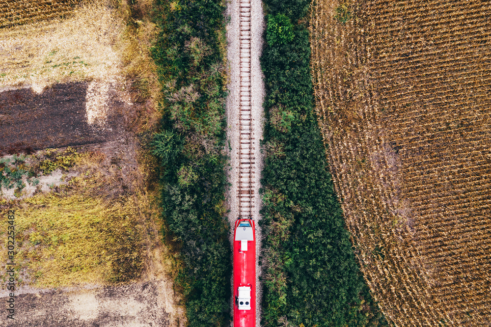 Aerial view of passenger train on railway Stock Photo | Adobe Stock