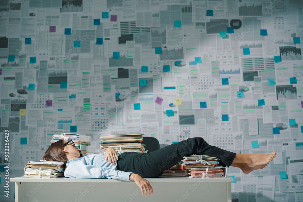 Exhausted business executive sleeping in the office Stock Photo | Adobe ...