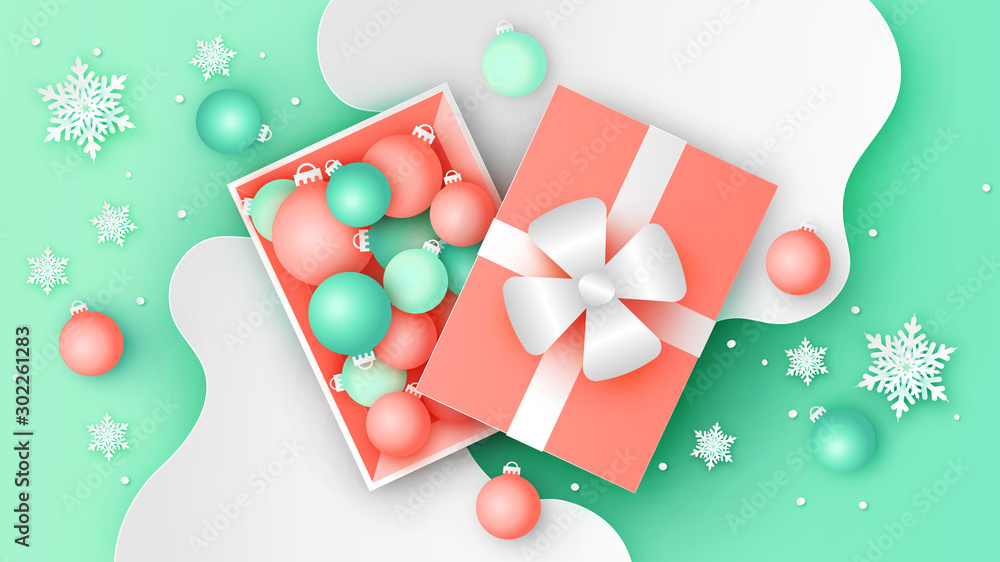 Christmas balls inside a gift box that open and decorate with ...