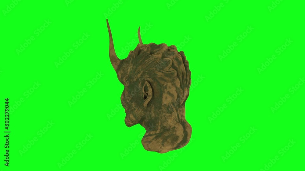 Old stone sculpture of a demon head on green screen.Lucifer statue bust ...