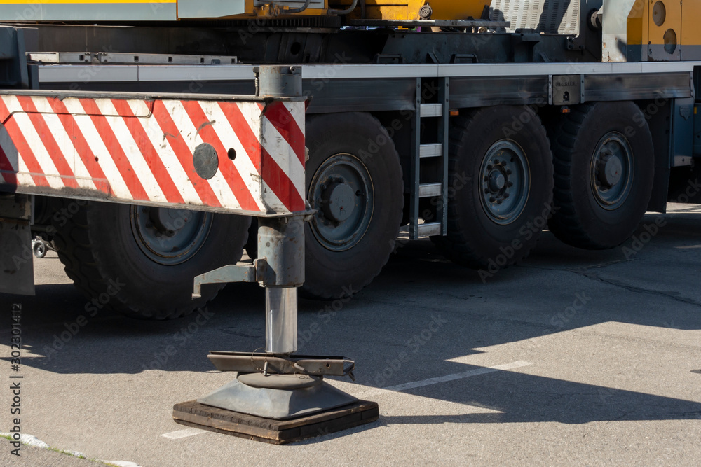 Hydraulic foot of the crane. Extended side truck outrigger stabilizer ...