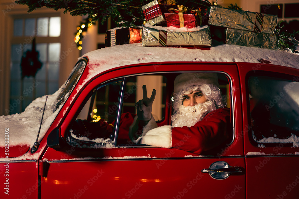 Portrait of Santa Claus. Santa Claus is driving a car foto de Stock ...