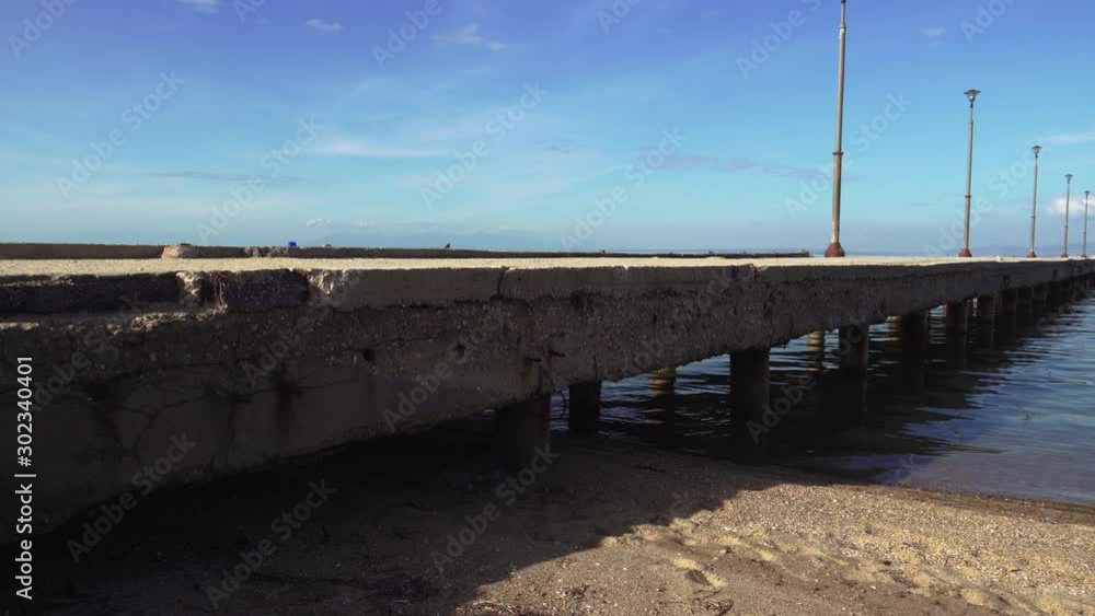 Seafront empty pier with lighting frames without a crowd. Day sunny ...