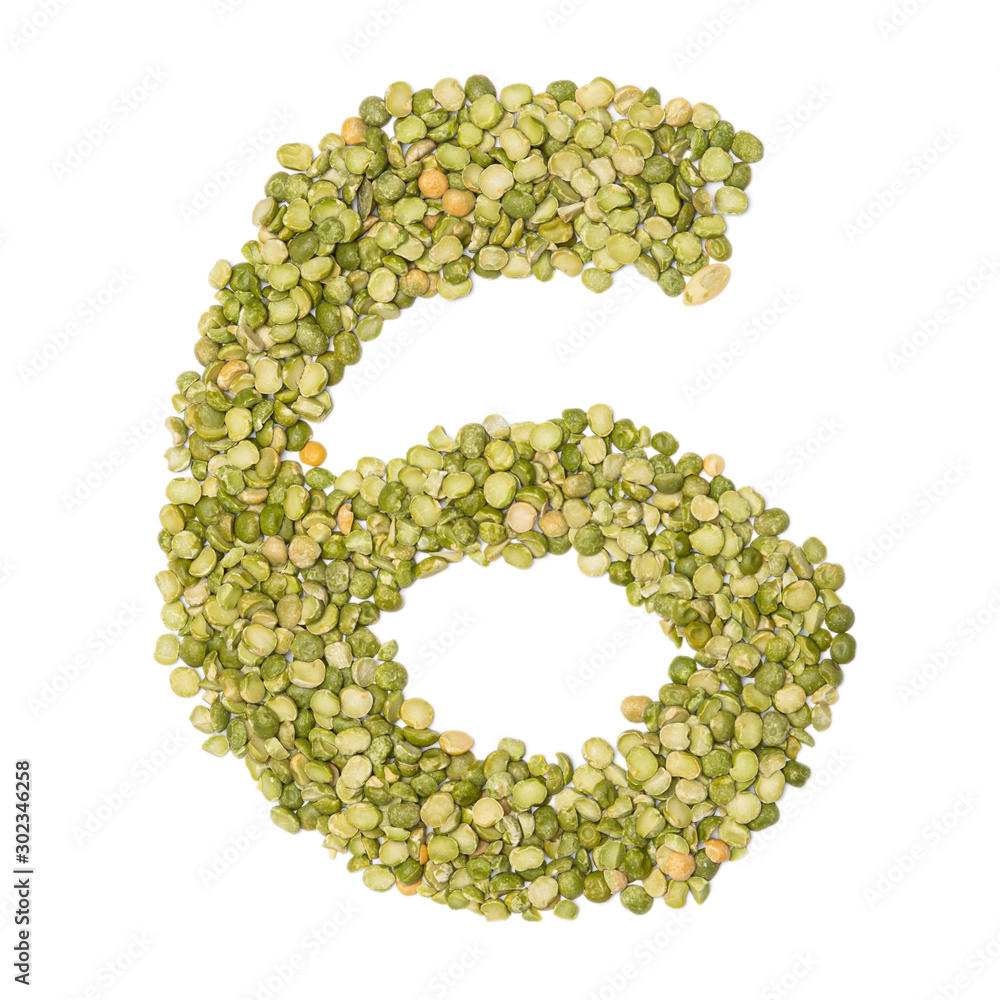 Arabic numeral "6" from freshly green chopped peas on a white isolated ...