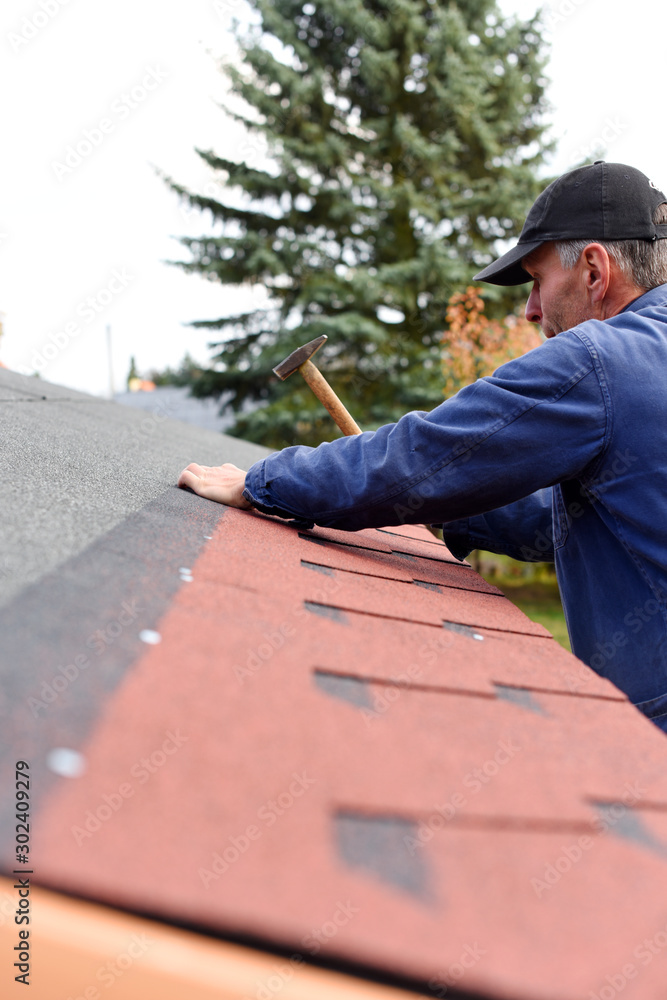 Foto de Modern roof shingles tiles. Soft asphalt roof cover and roofing ...