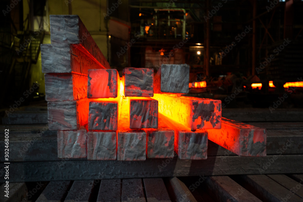 Heated metal pig gets squeezed and drilled at special metal forging ...