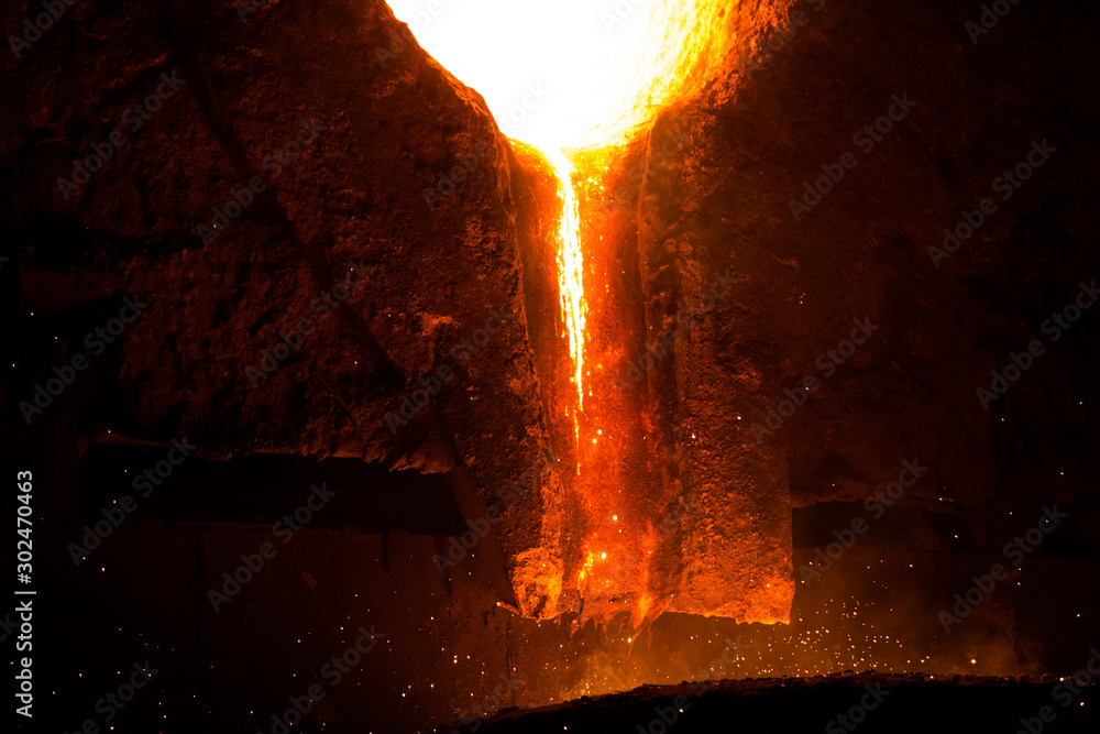 Heated metal pig gets squeezed and drilled at special metal forging ...