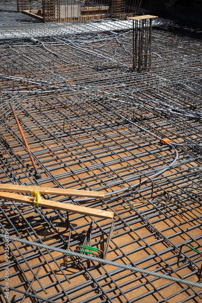 Rebar reinforcements in concrete forms at a skyscraper construction ...