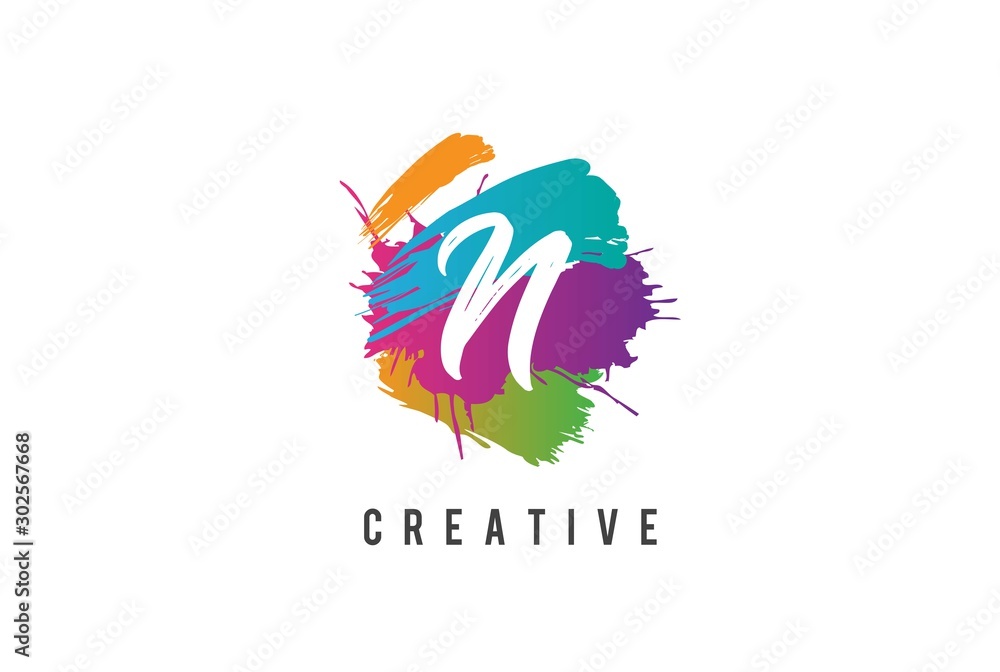 Hand lettering brush initial letter n inside colorful paintbrush ...
