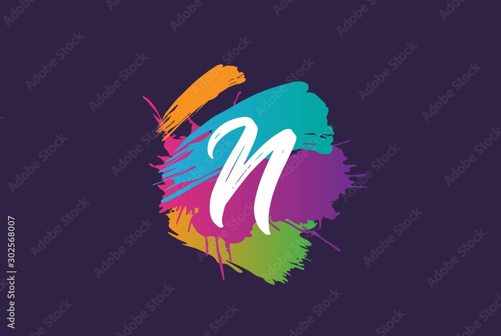 Hand lettering brush initial letter n with colorful paintbrush on dark ...