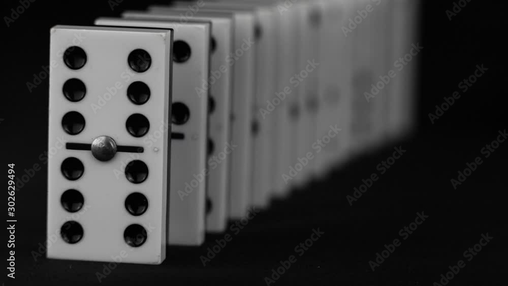 Domino effect. Row of white and black dominoes falling down. Chain ...
