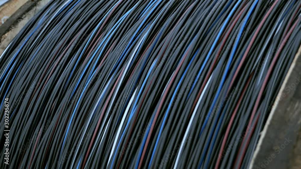 The manufacture of ropes. A bunch of ropes. High voltage cable reel ...