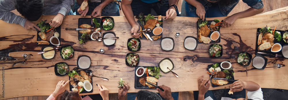Group of people eating dinner food together , top view. Stock Photo ...