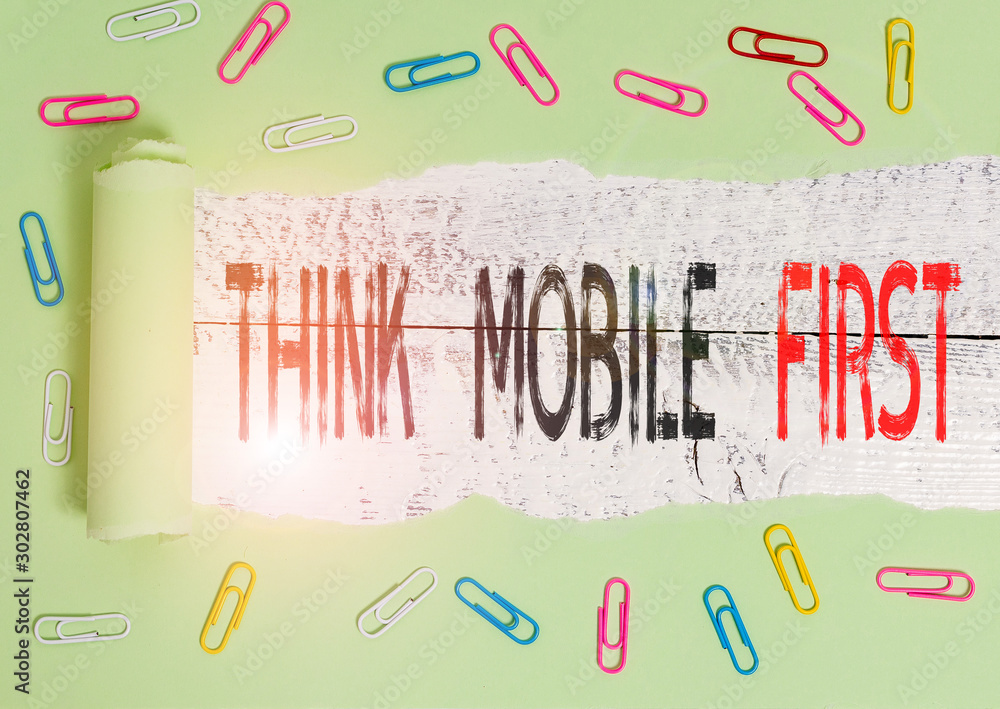 Word writing text Think Mobile First. Business photo showcasing Easy Handheld Device Accessible ...