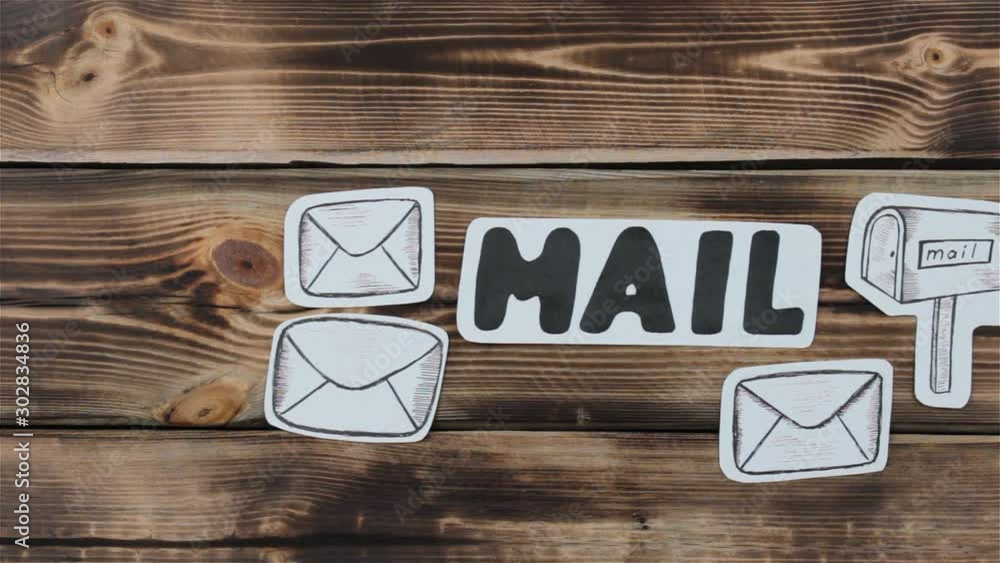 Paper drawing sketches with mail-themed letters on wooden Stock Video ...