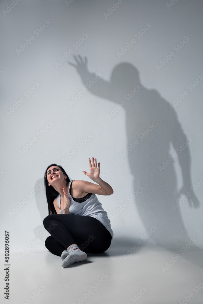 Woman in fear of domestic abuse, violence, concept of female rights ...