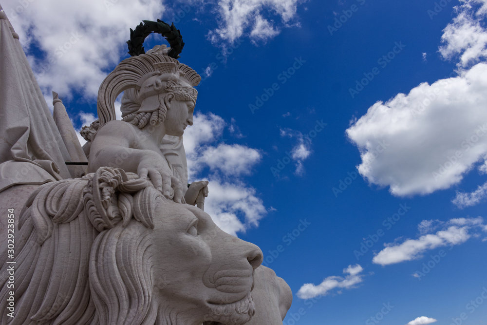 statue of lion and greek god in Lissabon Stock Photo | Adobe Stock