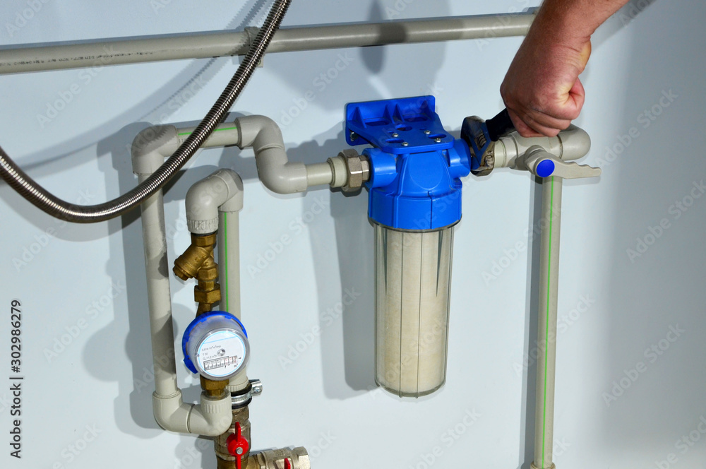 Mounting of house rainwater filter system. Borehole drilling and water ...