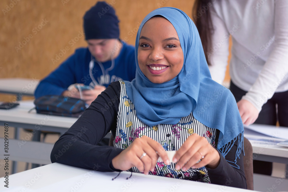 Beautiful female muslim african american architecture student looking ...