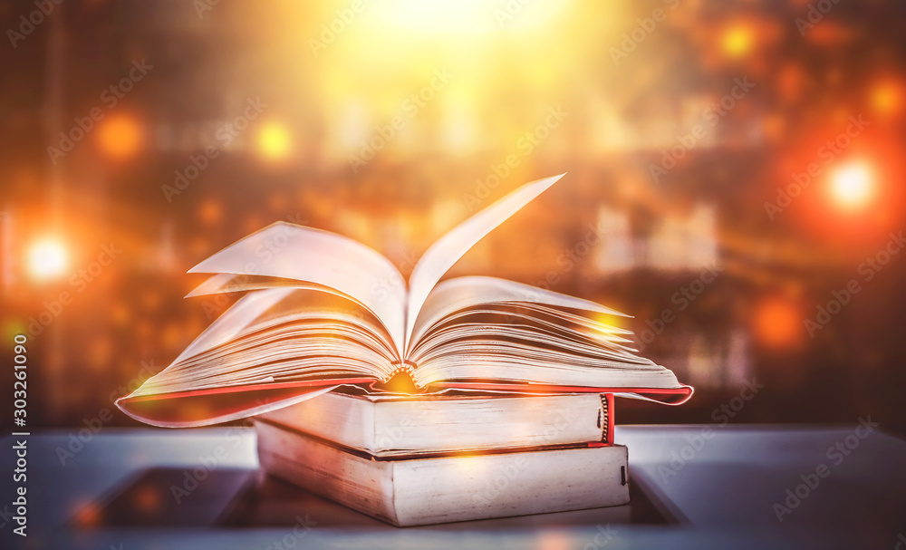 Images of ancient books open on wooden tables with beautiful overlays ...